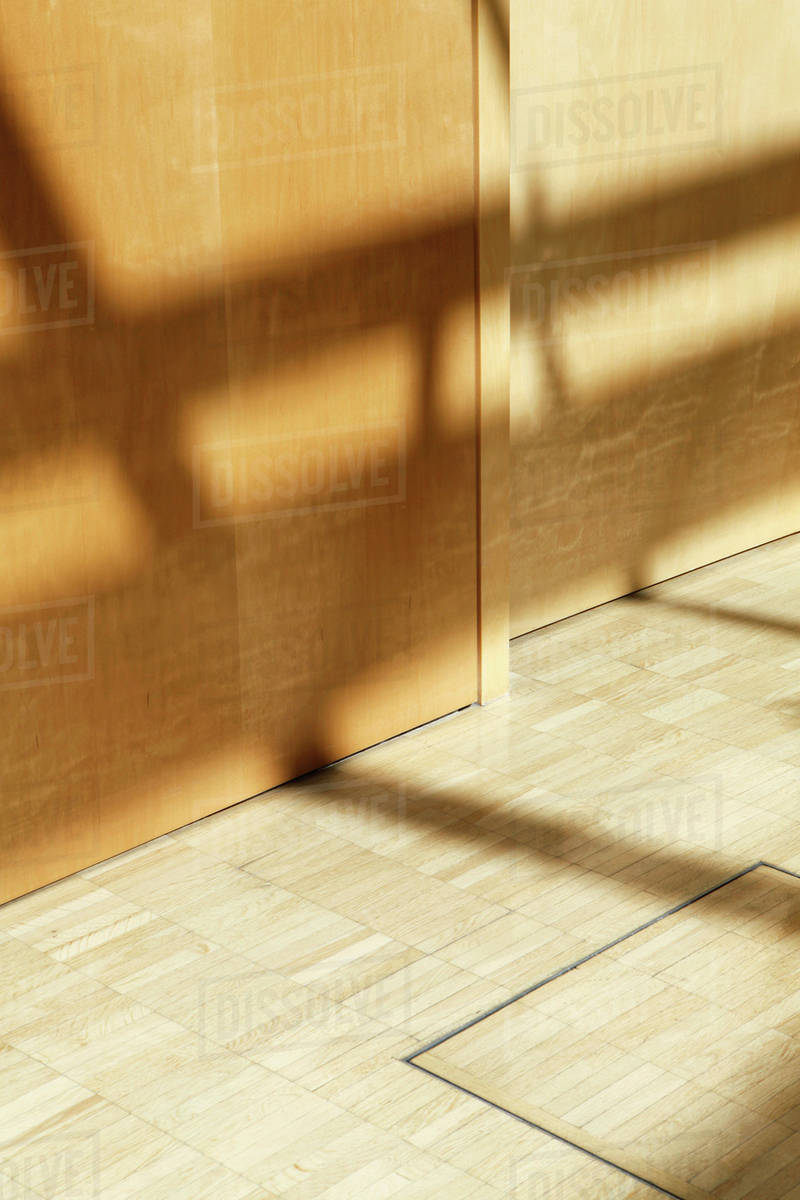 Shadows on a hardwood floor - Royalty-free Stock Photo | Dissolve